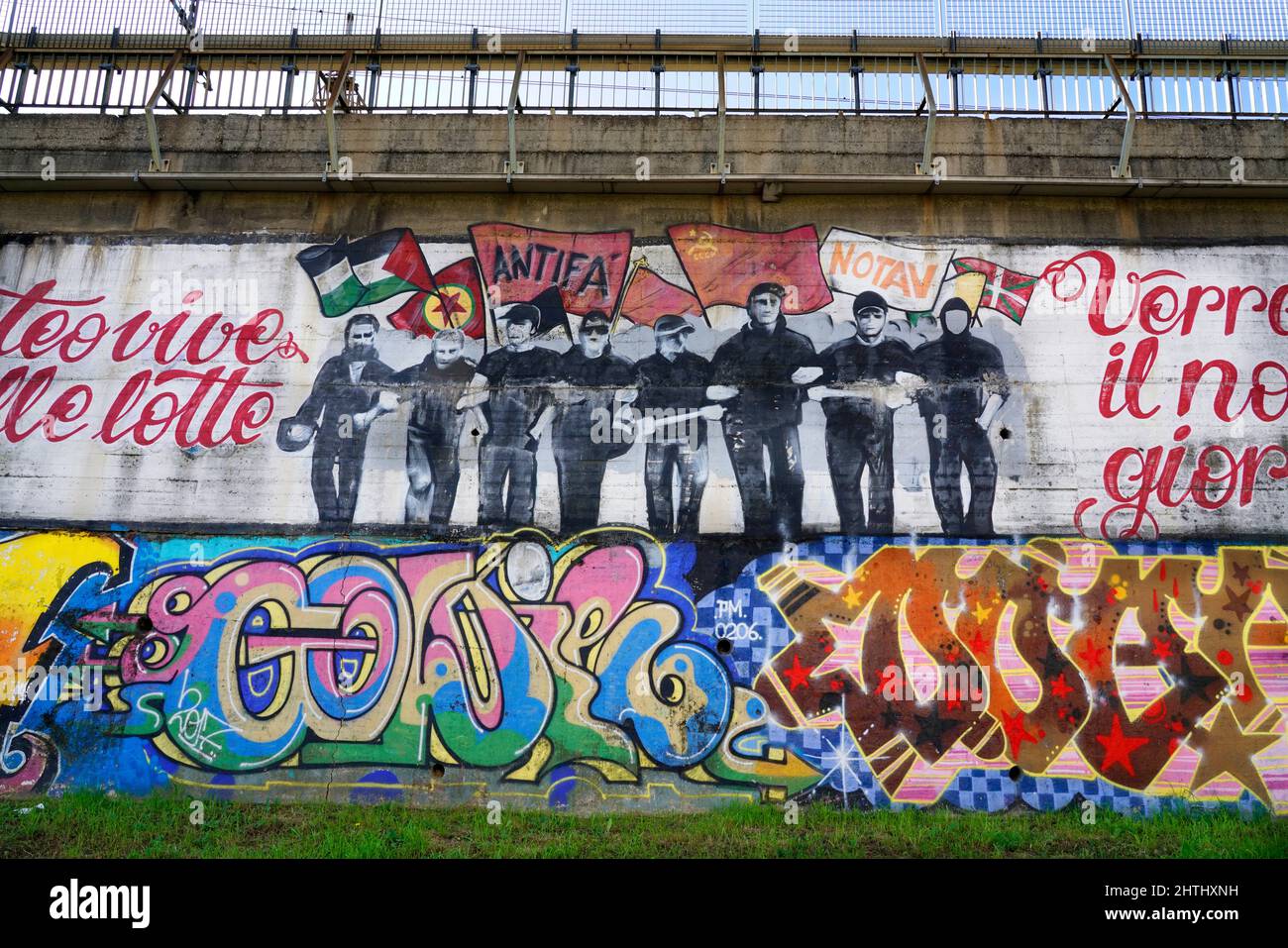 Graffiti street art on the walls of the railway in Lambrate district ...