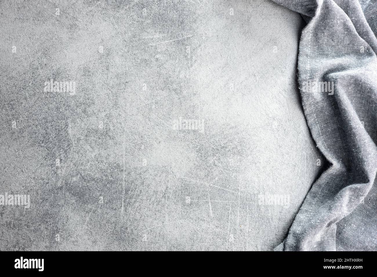 Kitchen table background with gray napkin. Top view Stock Photo - Alamy