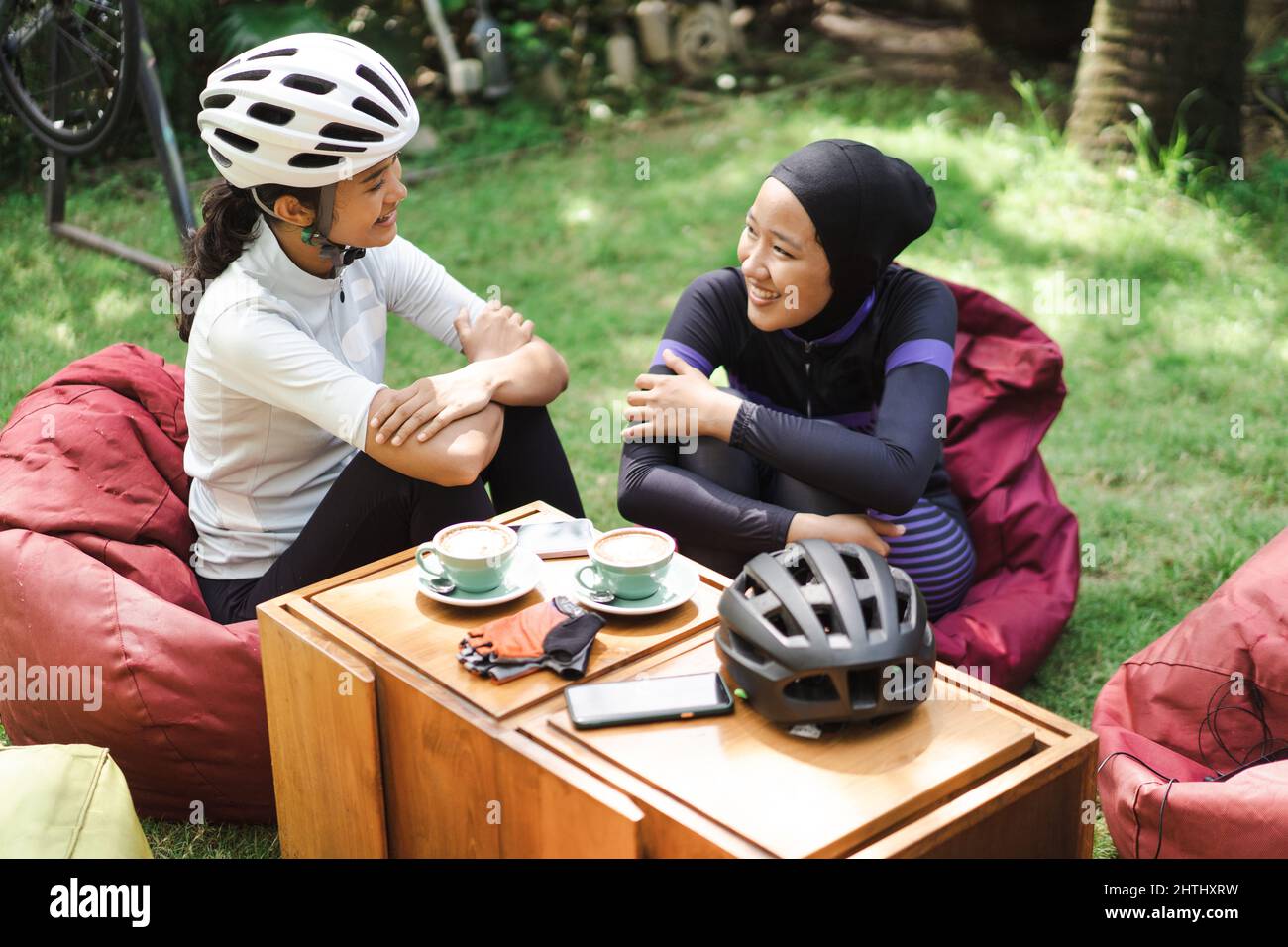 Asian teen ride bike helmet hi-res stock photography and images - Alamy