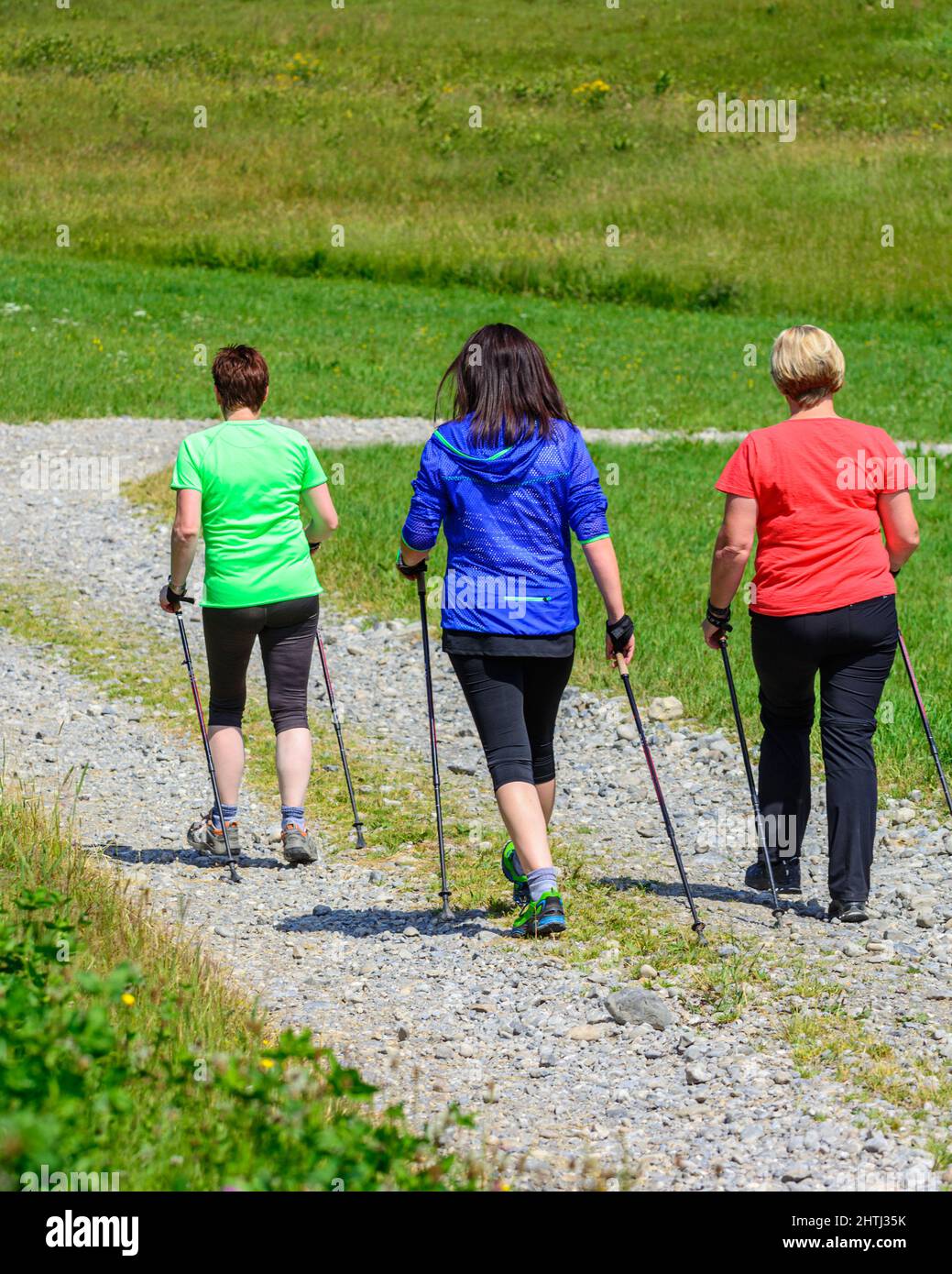 Nordic Walking exercise in beautiful springtime nature Stock Photo - Alamy