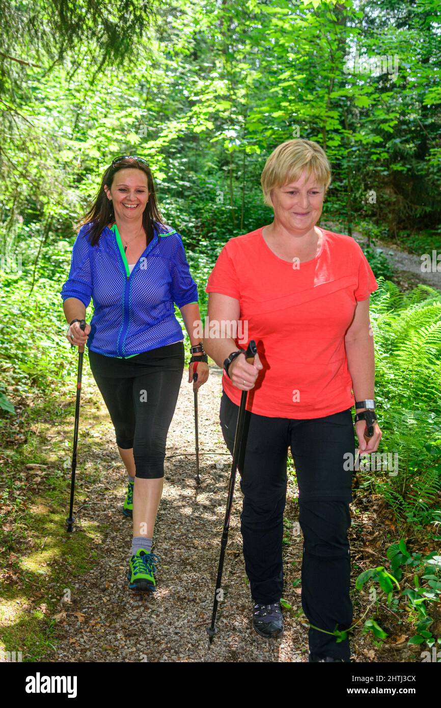 Nordic Walking exercise in beautiful springtime nature Stock Photo - Alamy