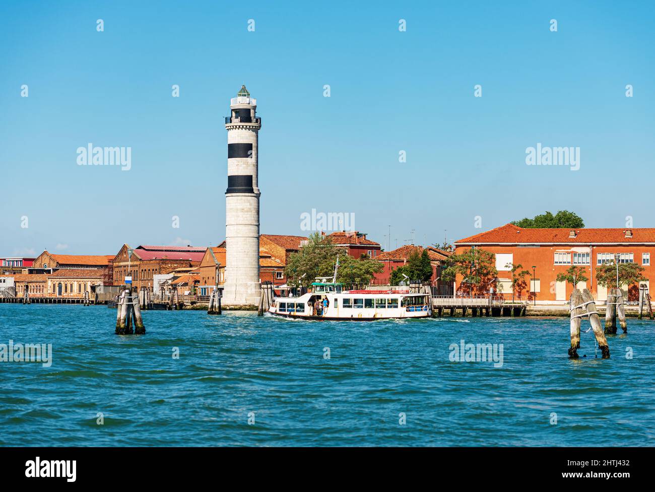 Lighthouse of the island of Murano, with the Vaporetto station (ferry ...