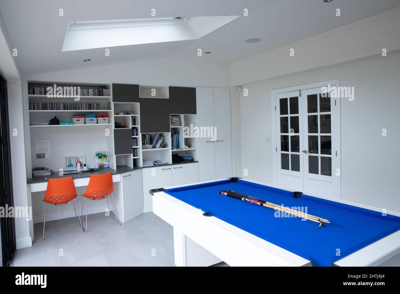 Working from home office with pool table for breaks Stock Photo - Alamy