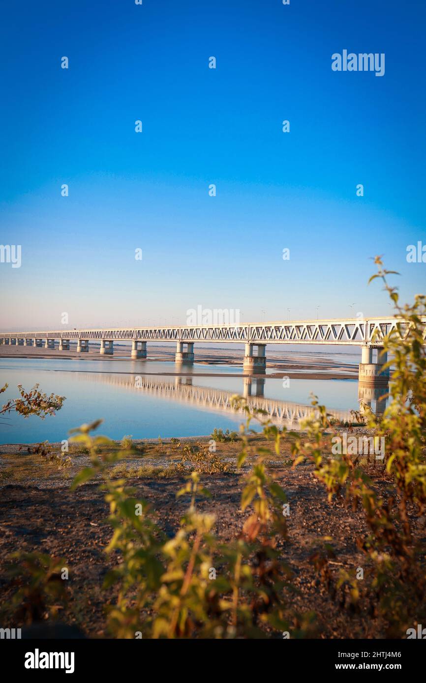 Vertical shot of a suspension bridge over the Brahmaputra river in ...