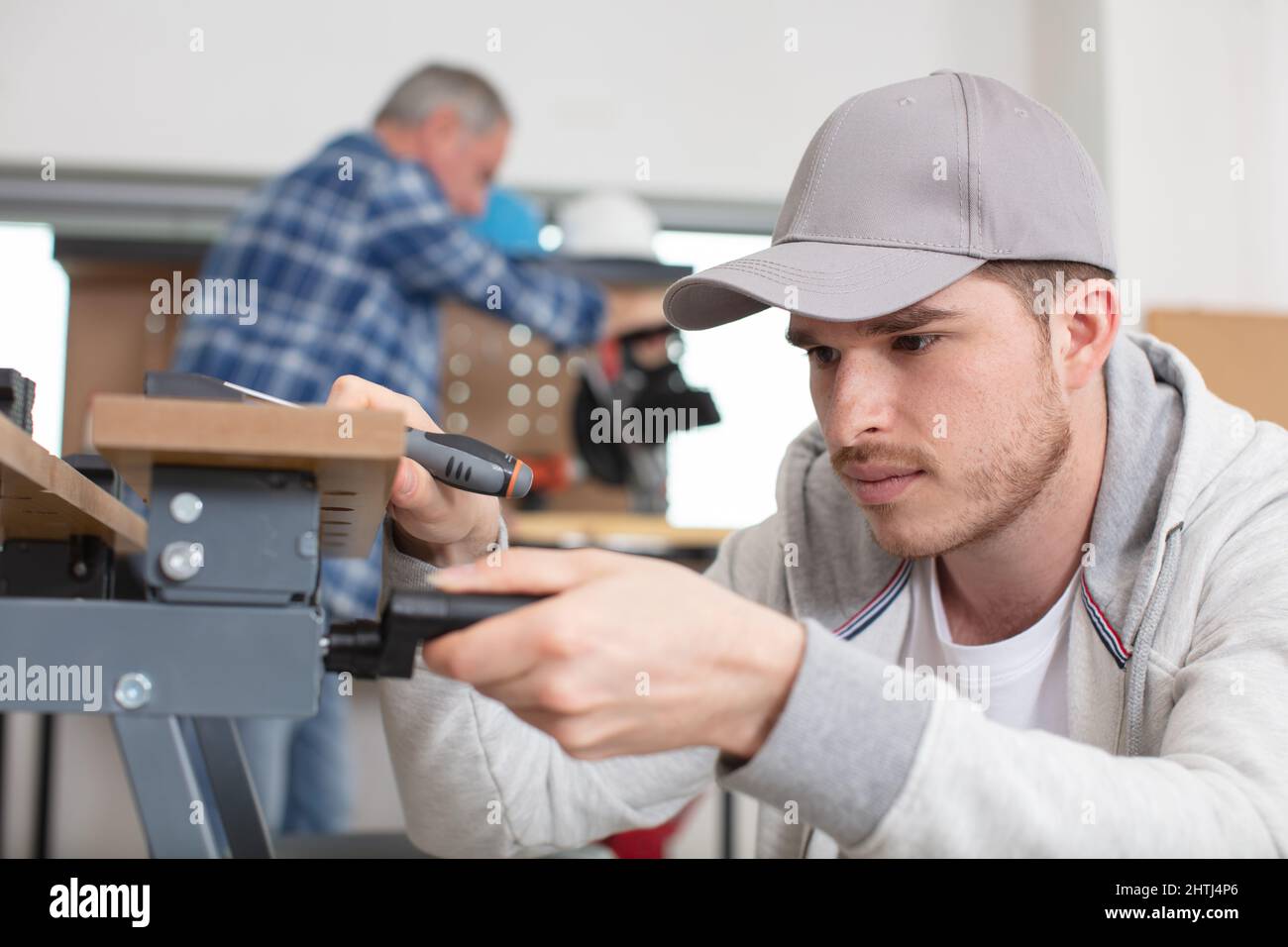 Professional teenager in apprenticeship hi-res stock photography and ...