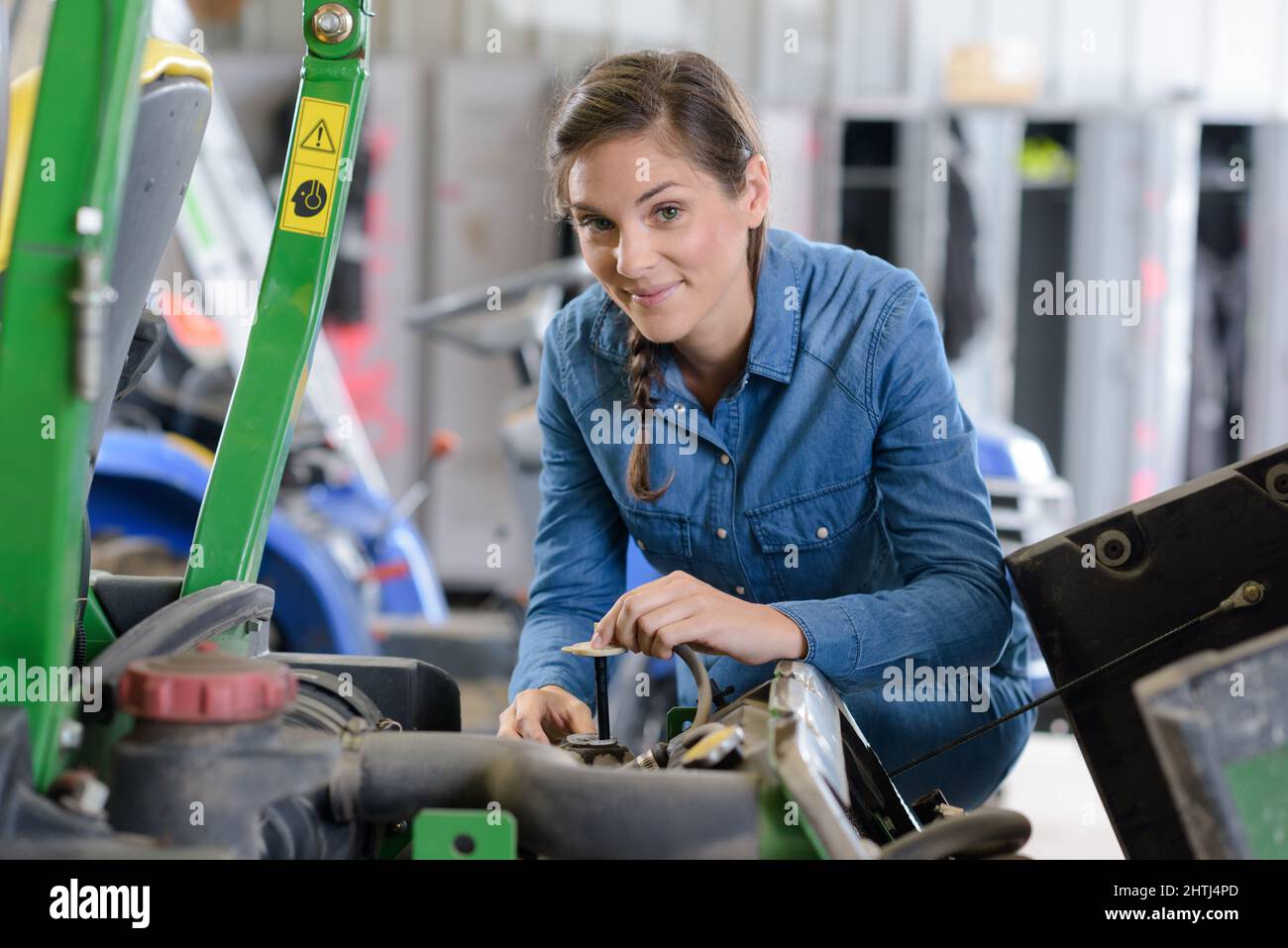 Fixing tractor hi-res stock photography and images - Alamy