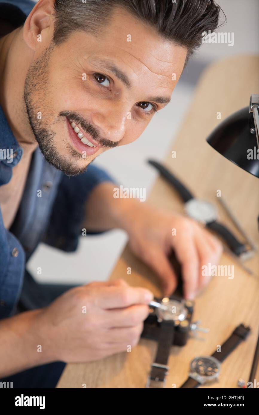 watchmaker fixing the watch movement Stock Photo - Alamy