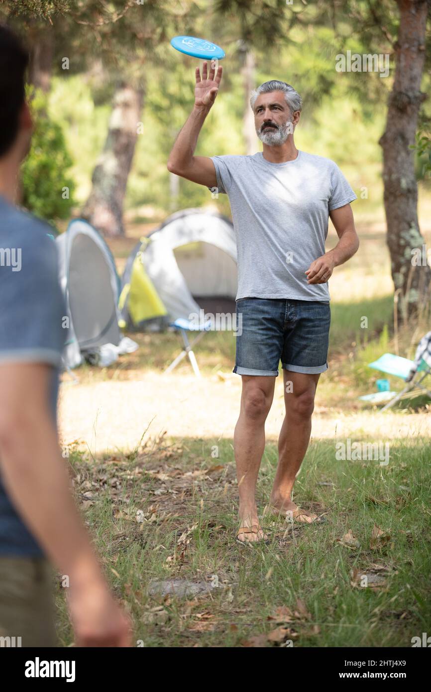 Two young men play frisbee hi-res stock photography and images - Alamy