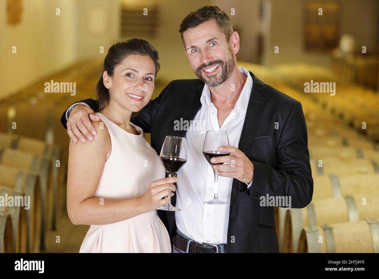 people tasting wine in cellar Stock Photo - Alamy