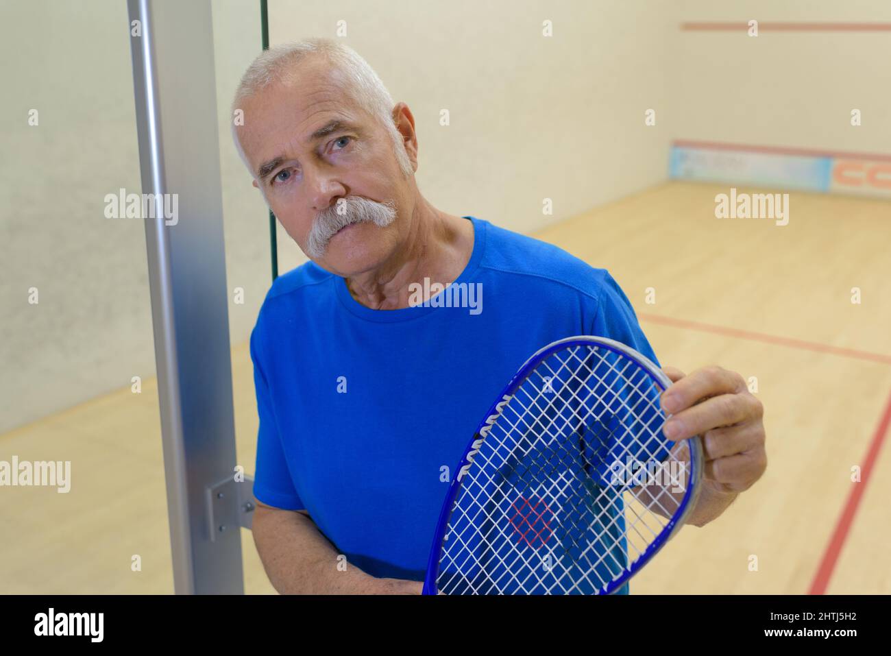 Old man holding racket hi-res stock photography and images - Alamy