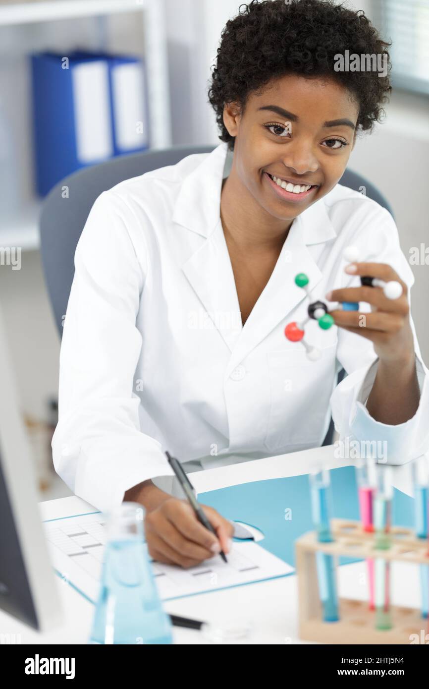 happy female during dna test in the lab Stock Photo - Alamy