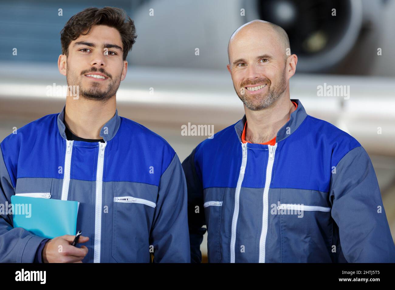 two aircraft assembling team posing Stock Photo - Alamy two aircraft assembling team posing Stock Photo - Alamy