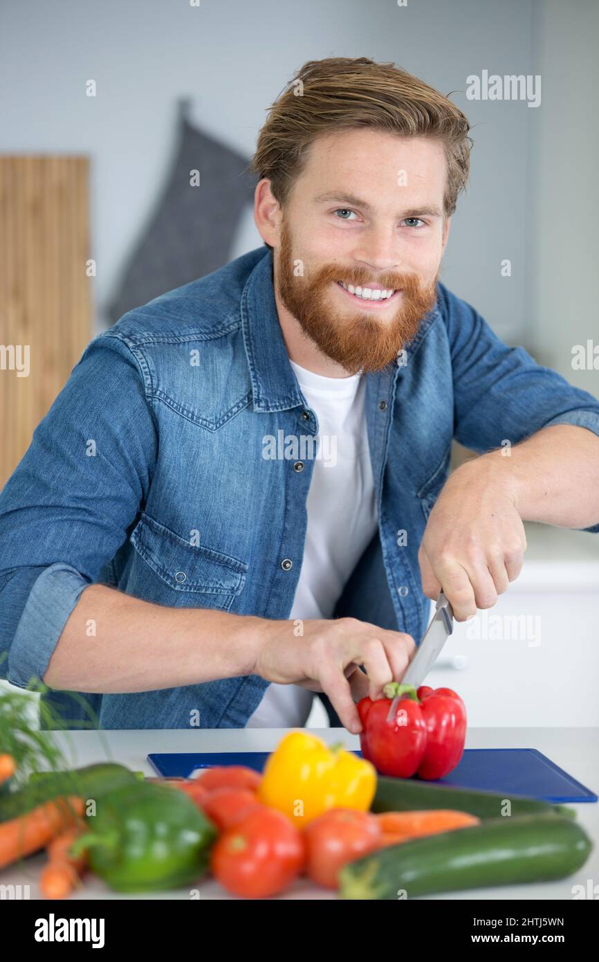 Person cutting vegetables red peppers hi-res stock photography and ...