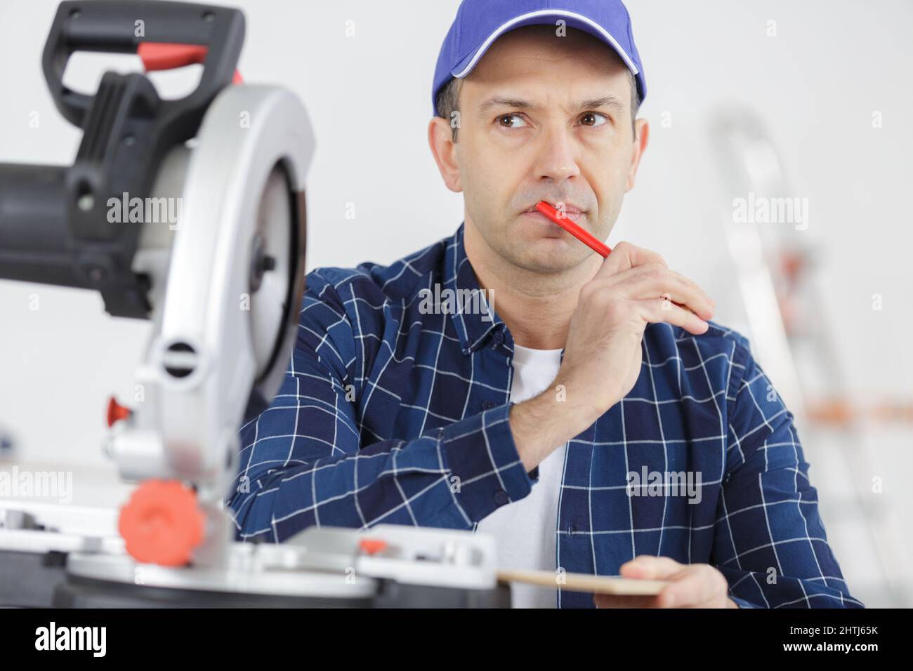 professional carpenter thinking in workshop Stock Photo - Alamy