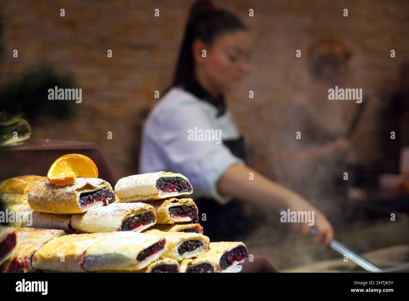Poppy seed and cherry Hungarian Strudel (Rétes) in a street eatery ...
