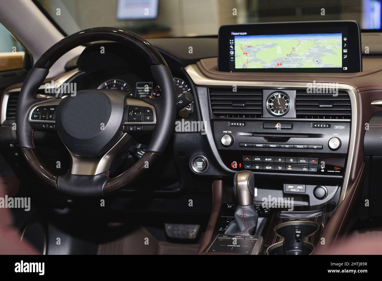 Car interior luxury steering wheel. Dashboard, climate control, display ...