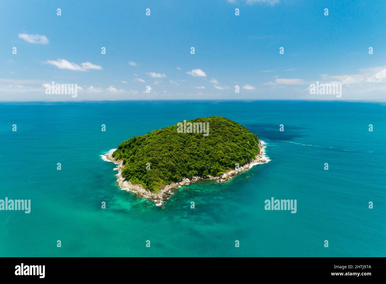 Aerial view landscape of small island in tropical sea against blue sky ...