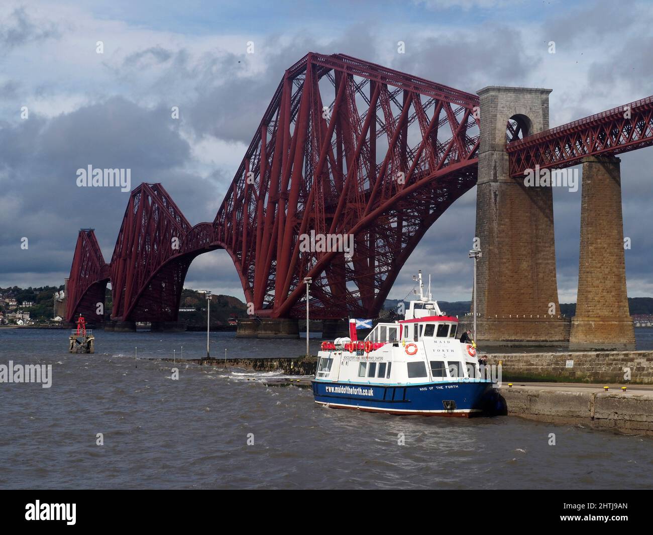 Forth rail bridge, Edinburgh, with Maid of Forth boat Stock Photo - Alamy