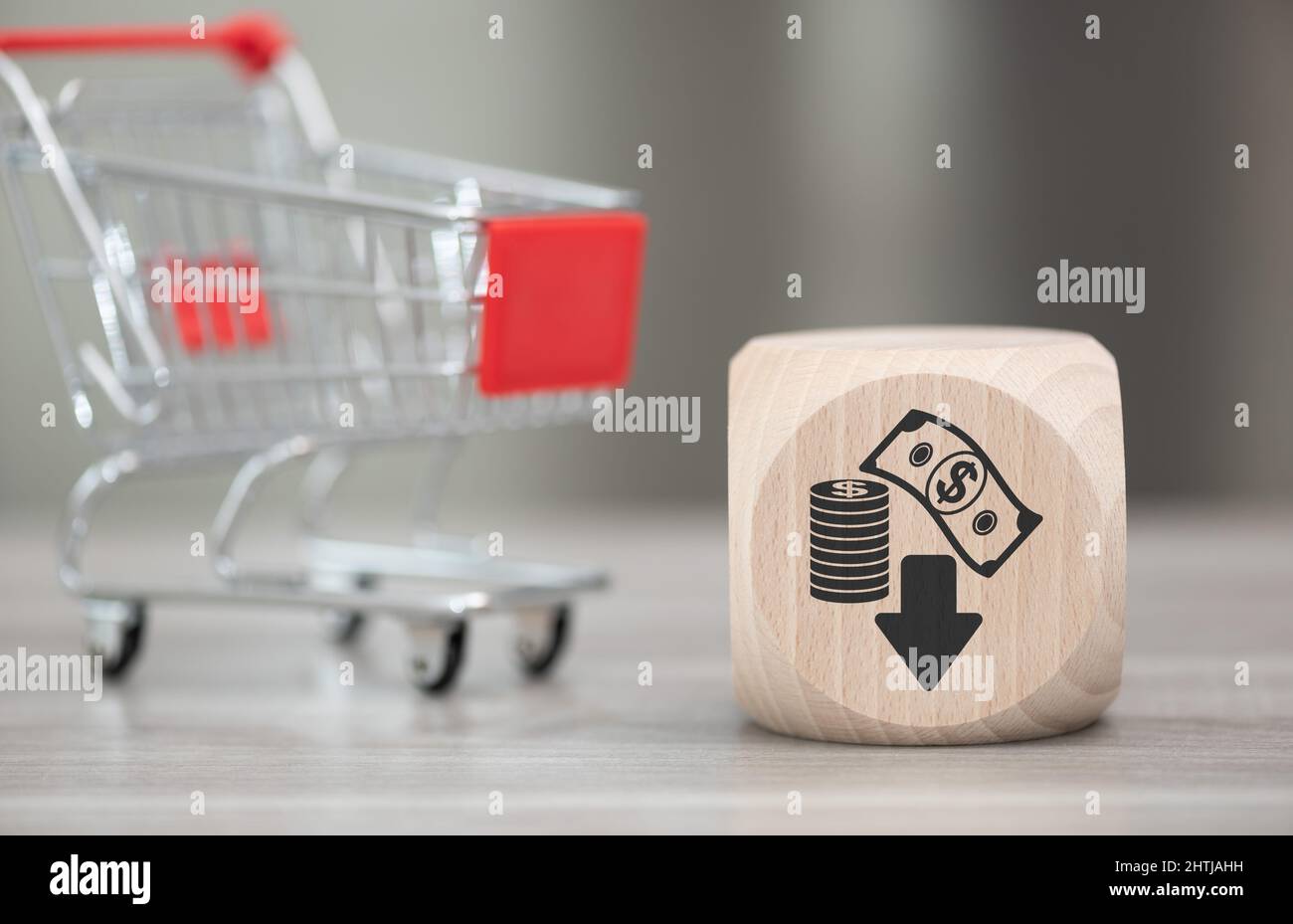 Wooden block with symbol of bankruptcy concept and trolley on ...