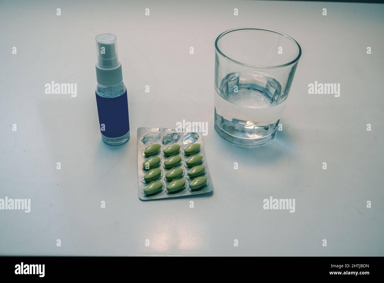 disinfectant gel tablets and glass of water Stock Photo - Alamy