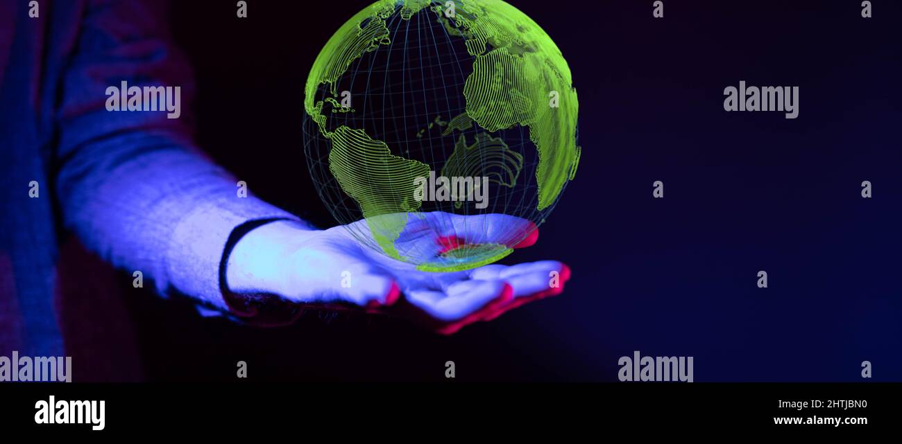 Hand holding an illustrative 3D world sign Stock Photo - Alamy