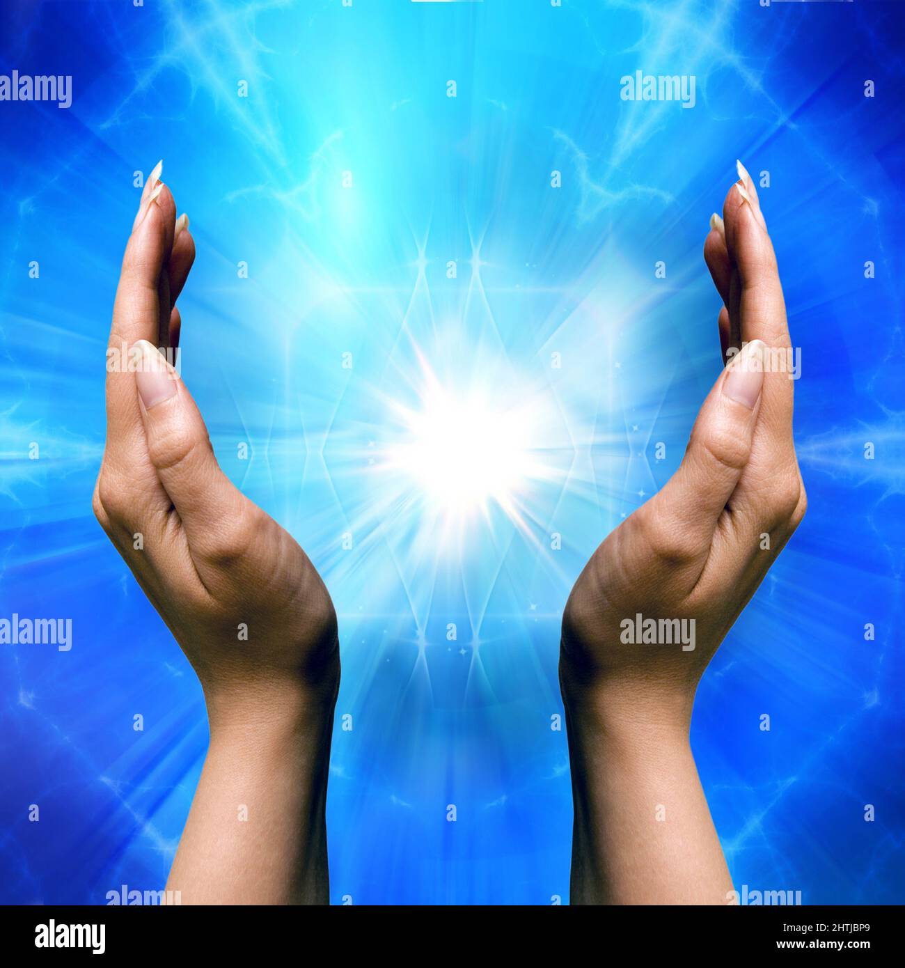 hand holding a mystical light, meditation adn soul searching concept ...