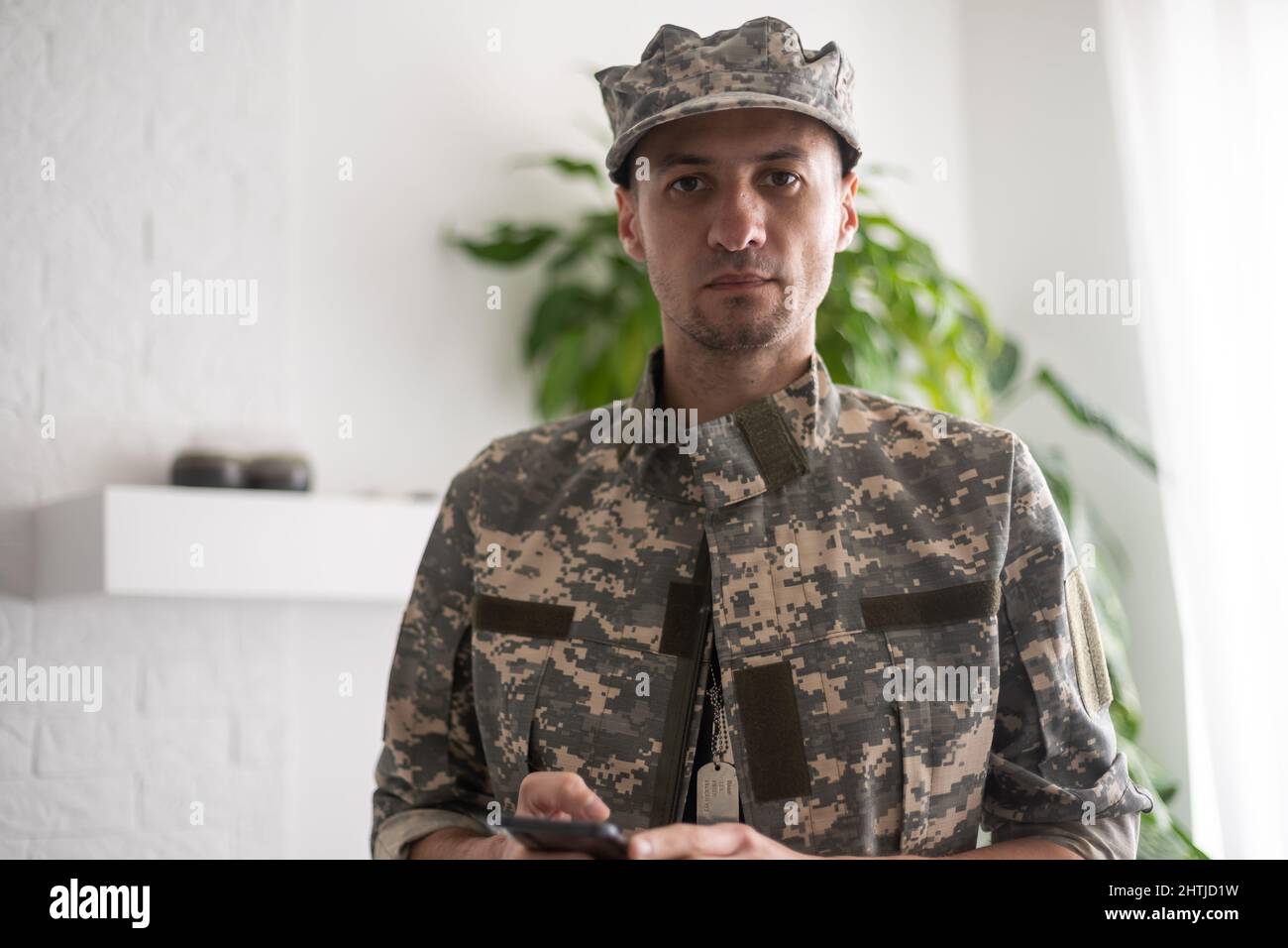 military soldier using mobile phone. letter Stock Photo - Alamy