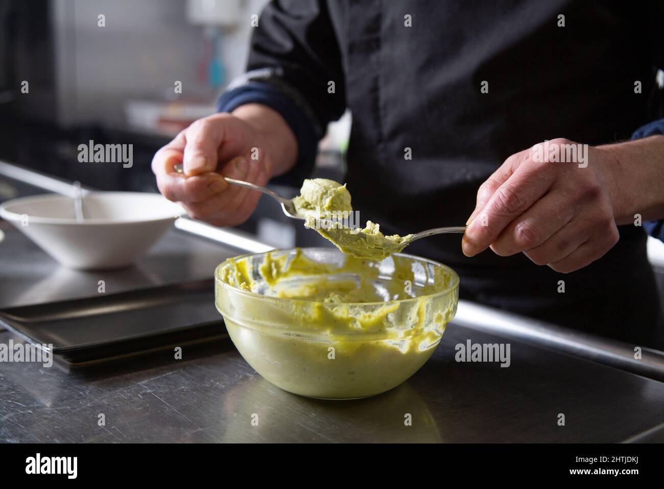 Side view of focused male musician playing piano while practicing from ...