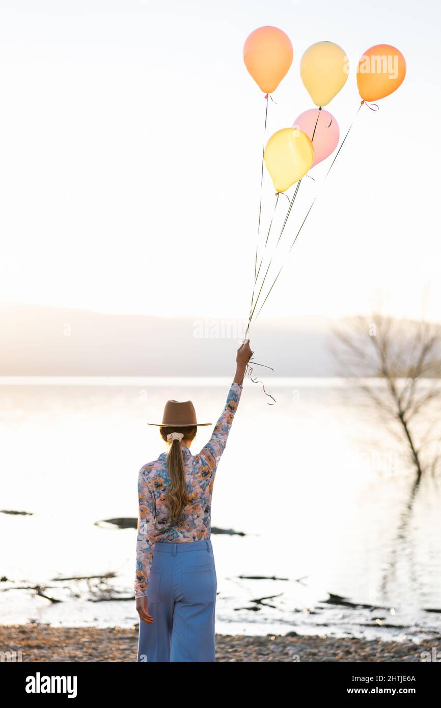 Serious artist playing stringed musical instrument while practicing ...