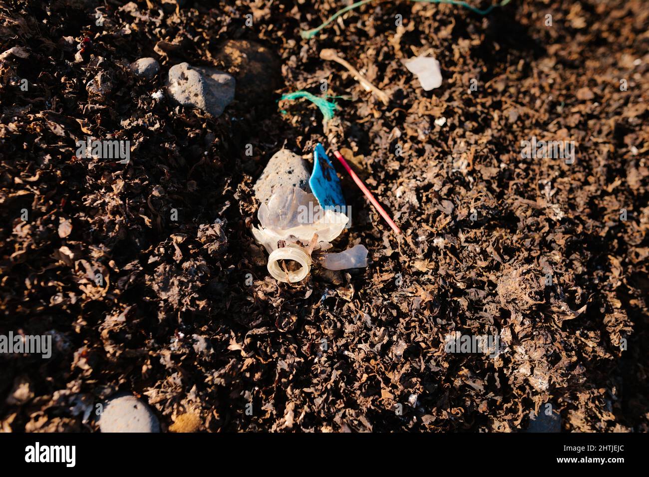 High angle of plastic trash on messy ground polluted with waste harmful ...