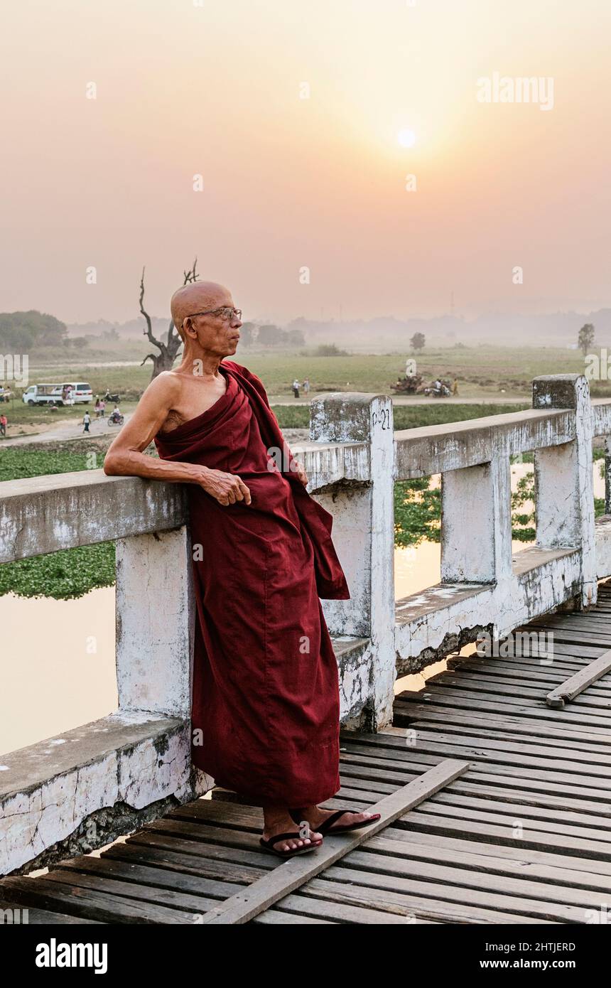 MYANMAR - APRIL 11, 2017: Full body of bald senior Buddhist monk in ...