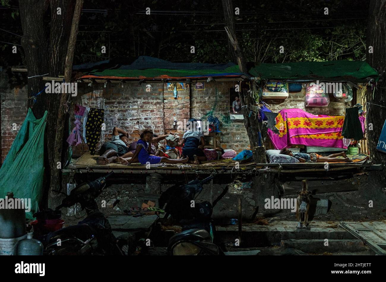 Poor family living on street hi-res stock photography and images - Alamy