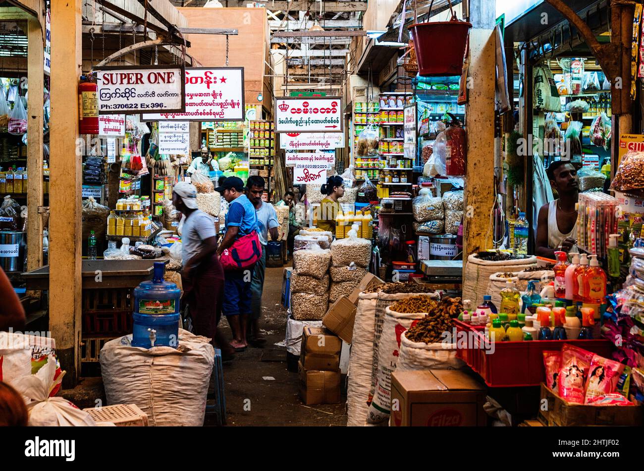 MYANMAR - APRIL 10, 2017: Side view of unrecognizable ethnic sellers ...