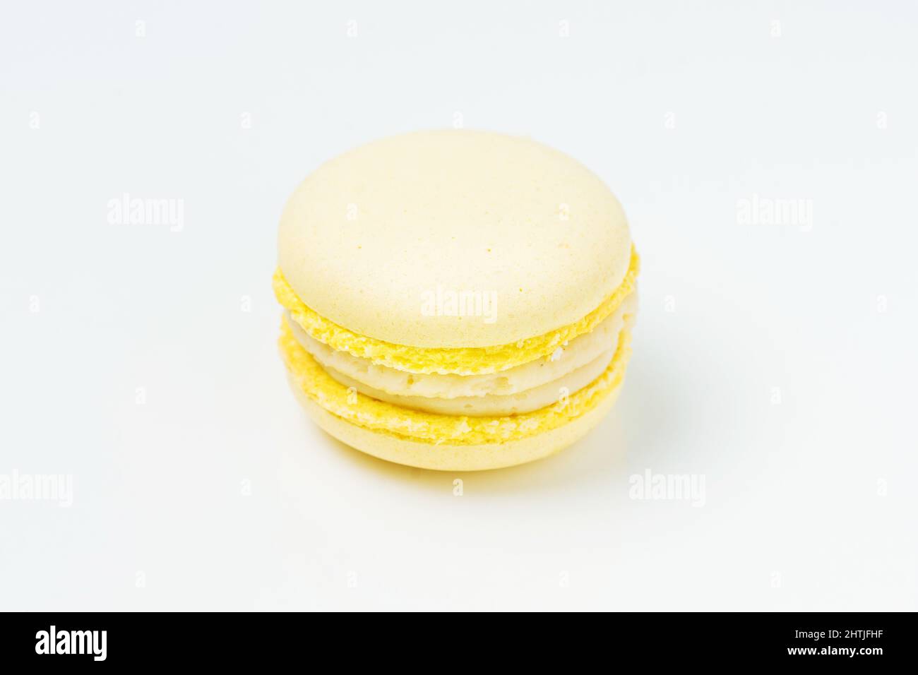 From above one tasty round shaped lemon flavored macaroon with sweet ...