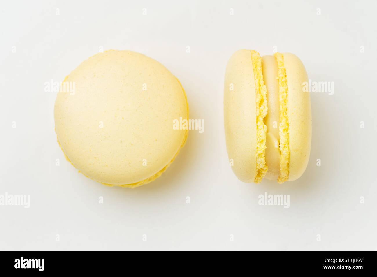 Top view of tasty round shaped lemon flavored macaroons with sweet ...