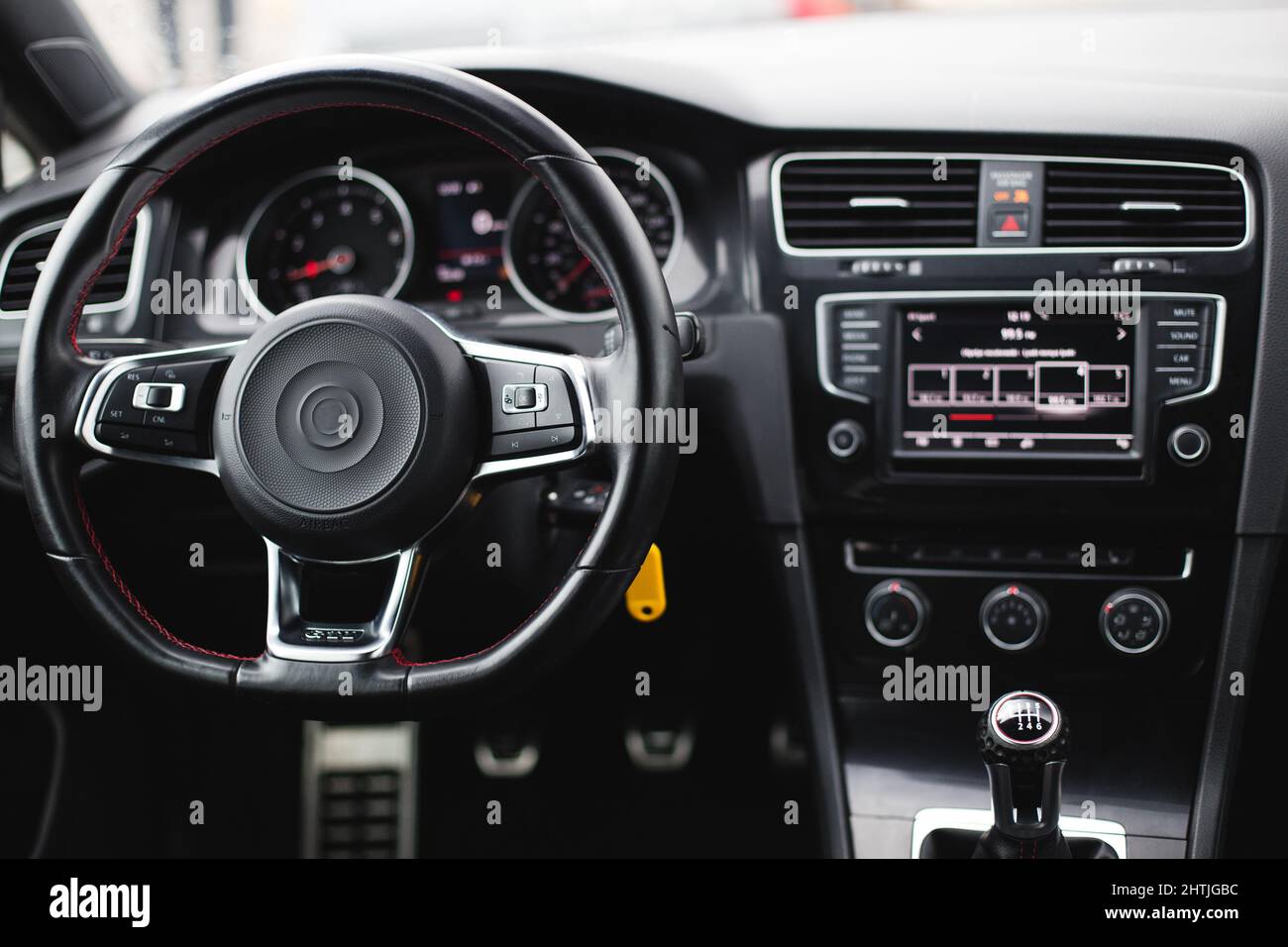 Car interior luxury steering wheel. Dashboard, climate control, display ...