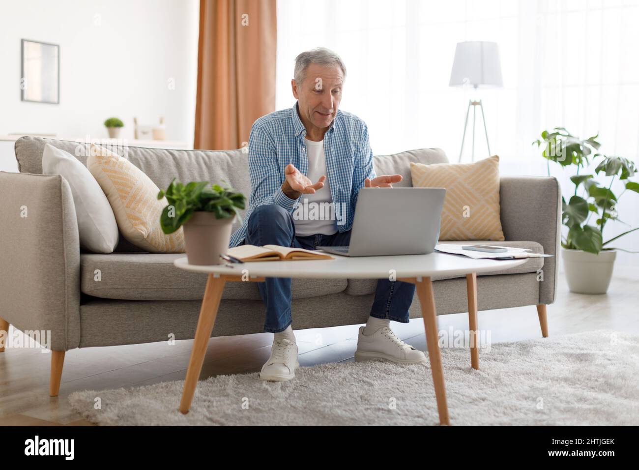Man having video call using hi-res stock photography and images - Alamy