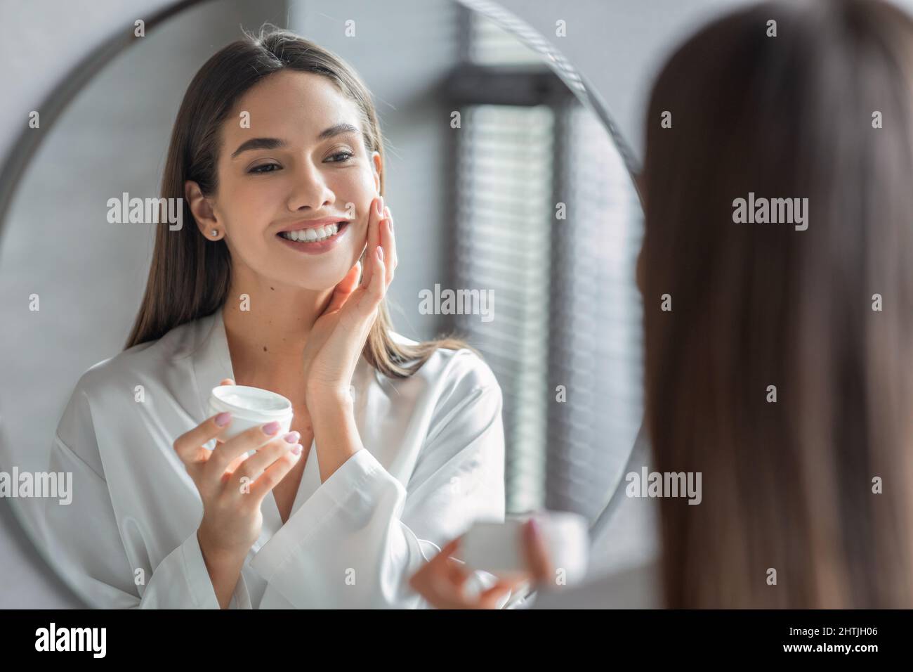 Woman face cream mirror hi-res stock photography and images - Alamy