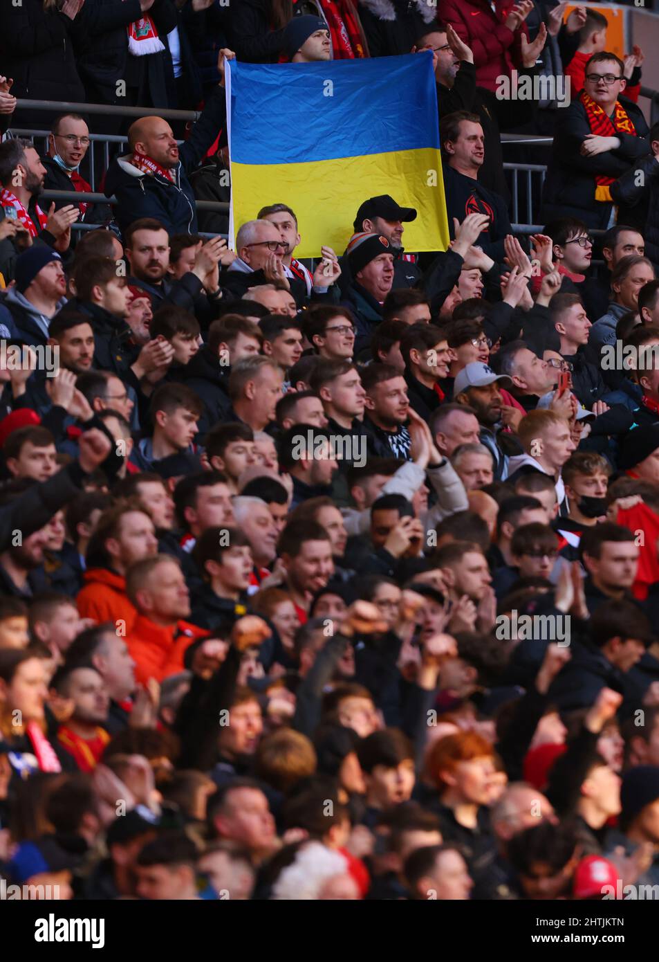 Ukrainian flag is seen amongst Liverpool fans inside Wembley Stadium ...