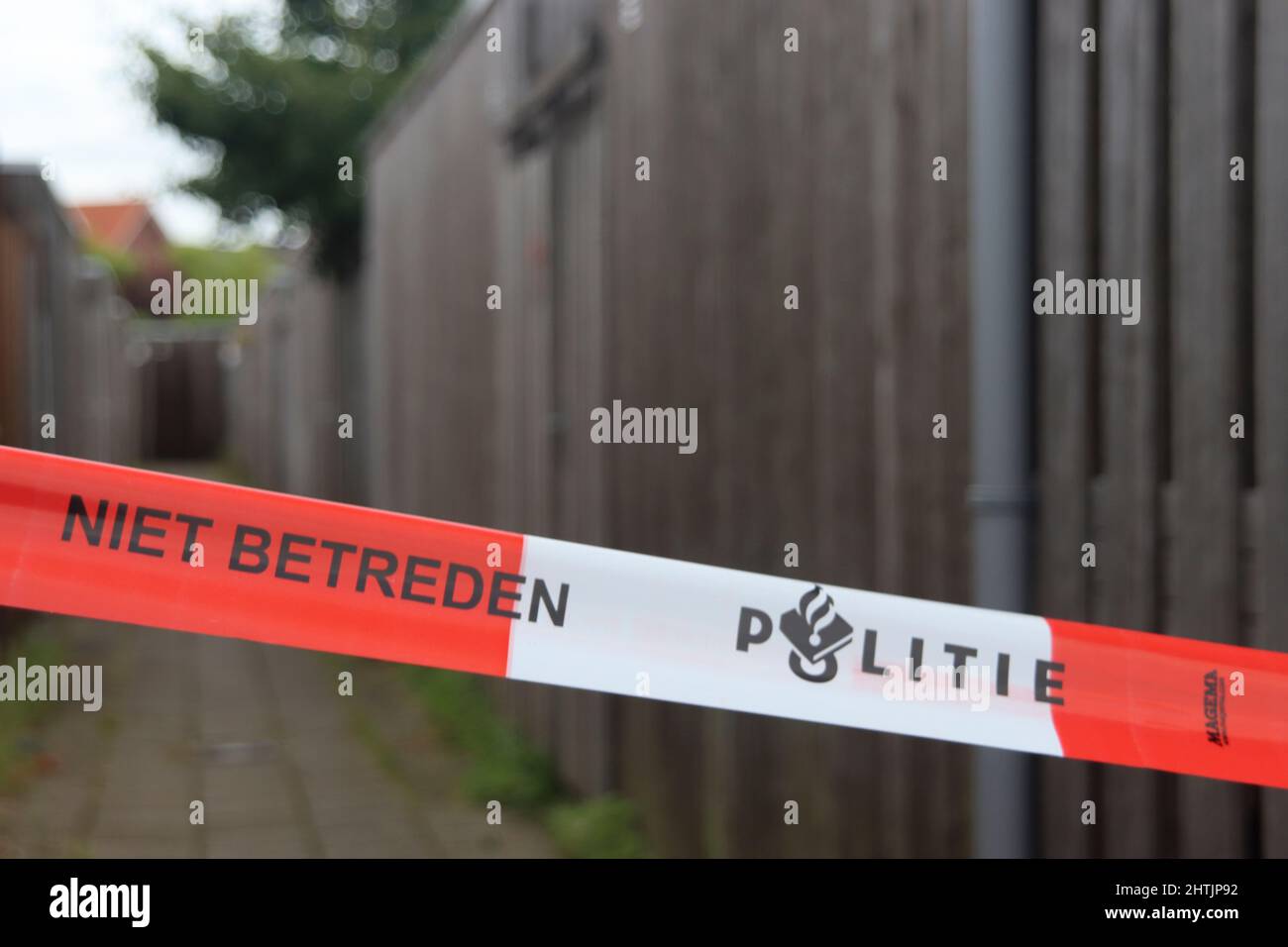 Police lint to block crime scene in Rotterdam with dutch text Politie ...