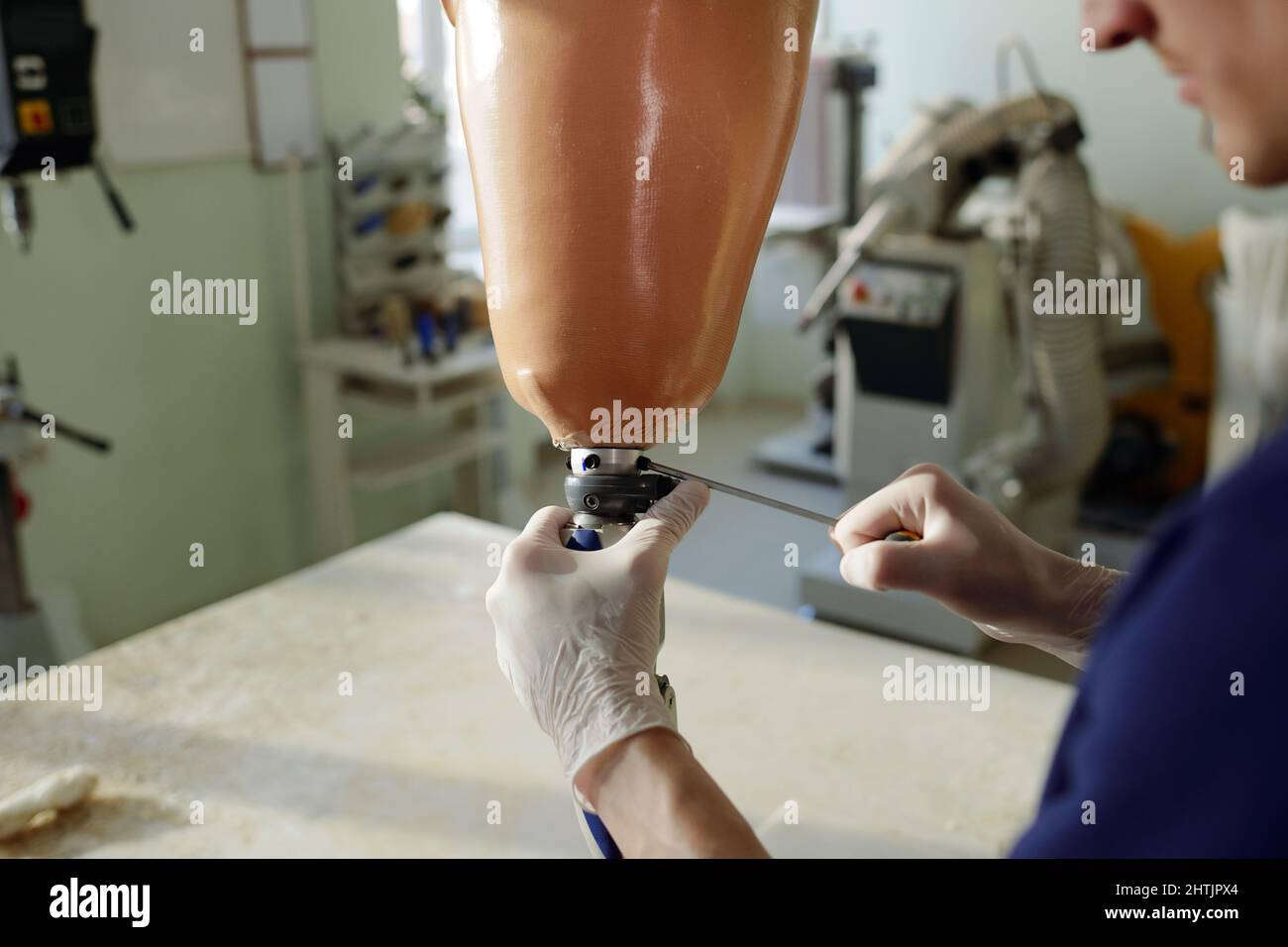 Specialist of prosthetic production factory fixing socket of leg ...
