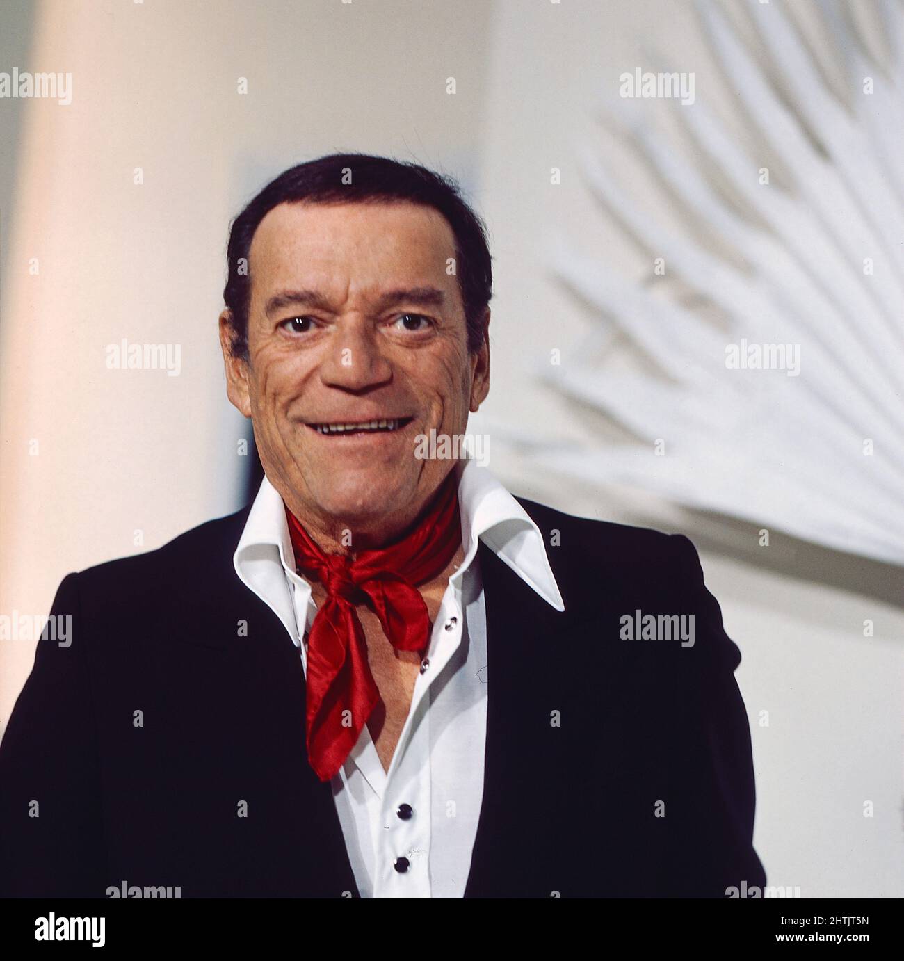 Eddie Constantine, amerikanischer Filmschauspieler und Chansonnier, Portrait von 1980. Eddie ...