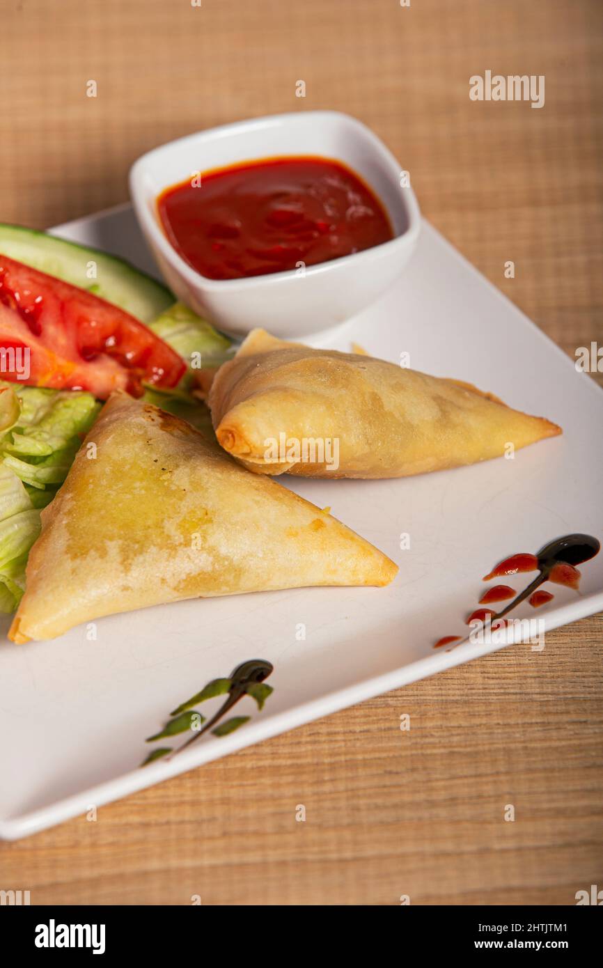 vegetable samosa served with sauces Ramadan Indian food, Pakistani food ...