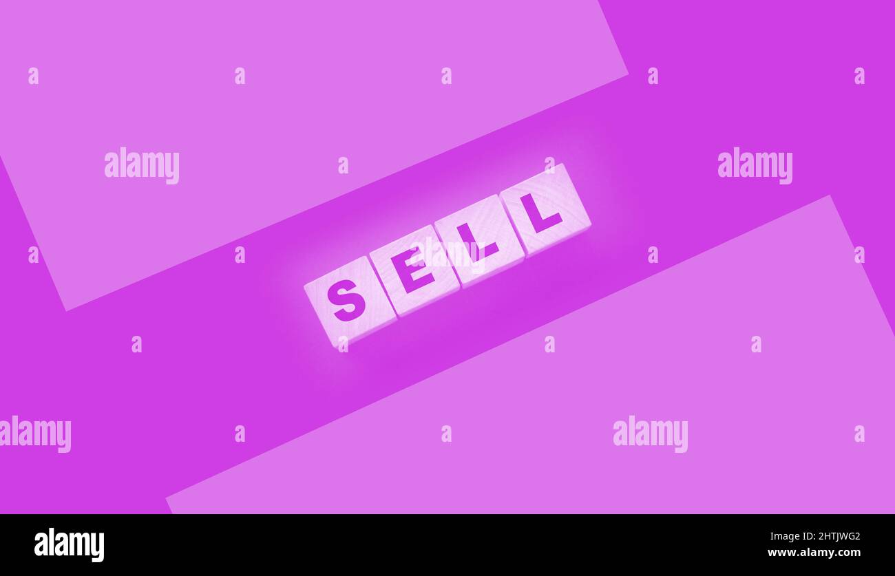 Wooden cubes with word sell on the dark background. Shopping concept ...