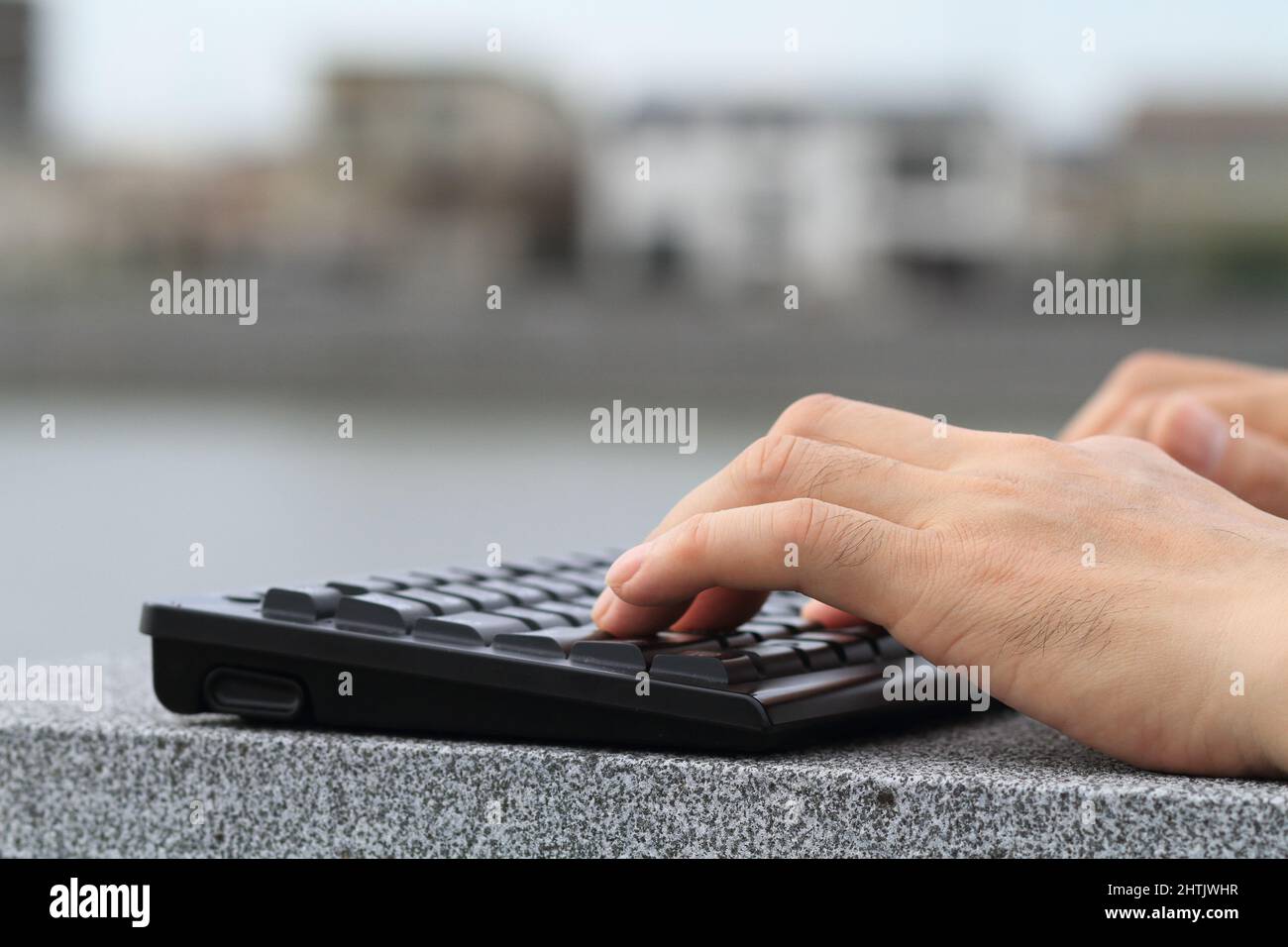 Typing with one hand hi-res stock photography and images - Alamy