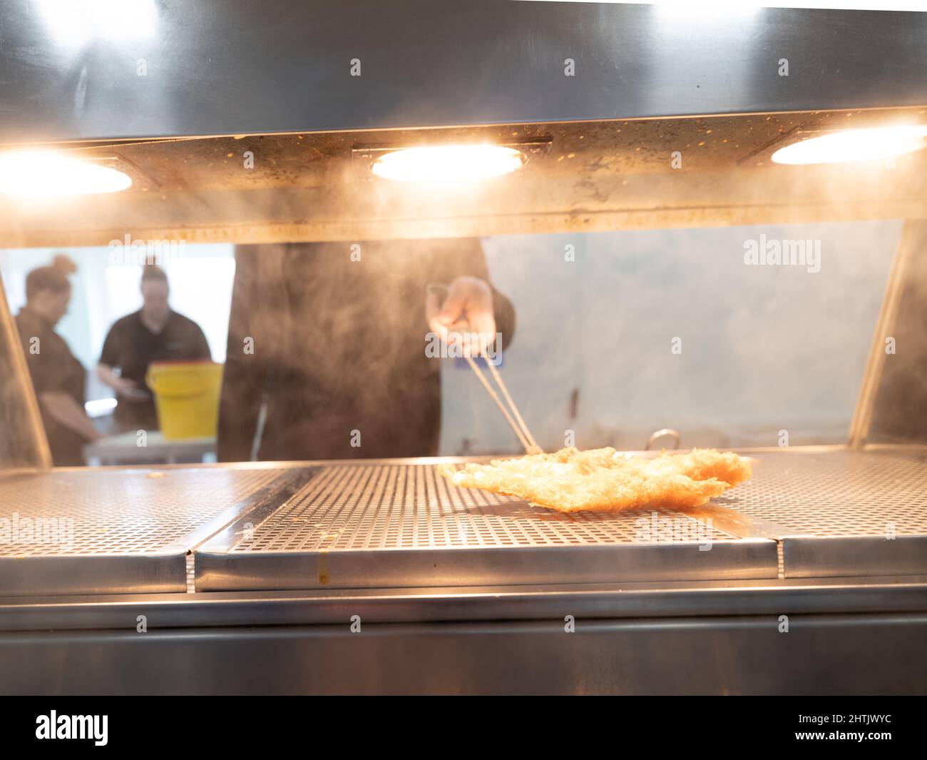 Freshly fried fish in crispy golden batter, at Compo's fish and chip ...