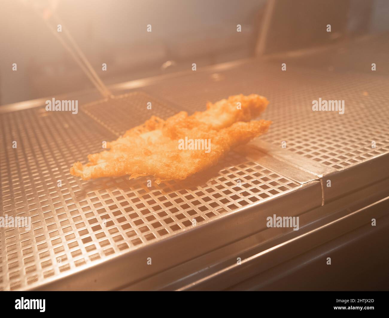 Freshly fried fish in crispy golden batter, at Compo's fish and chip ...