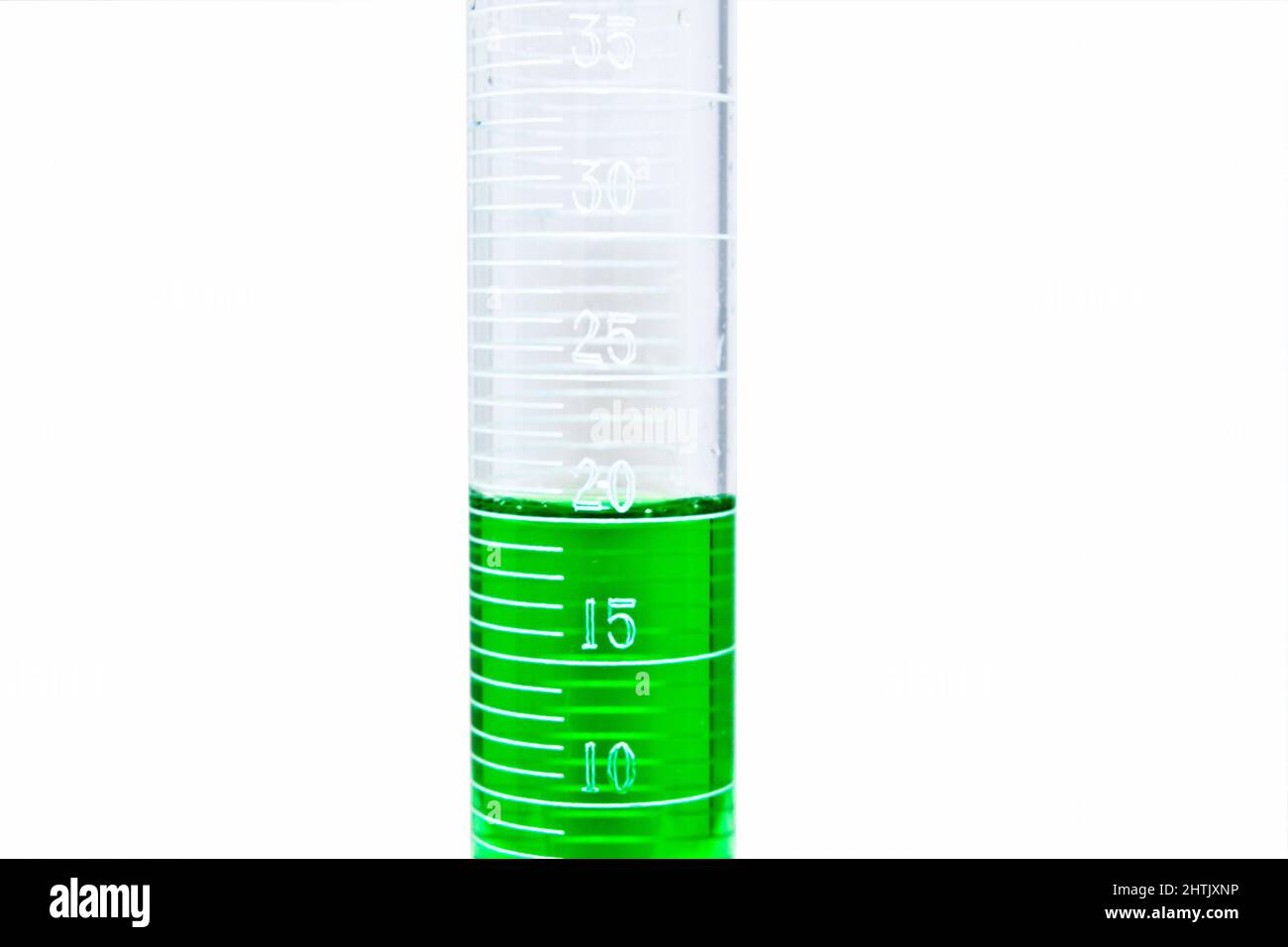 Chemical tube with a green liquid on a white background Stock Photo - Alamy