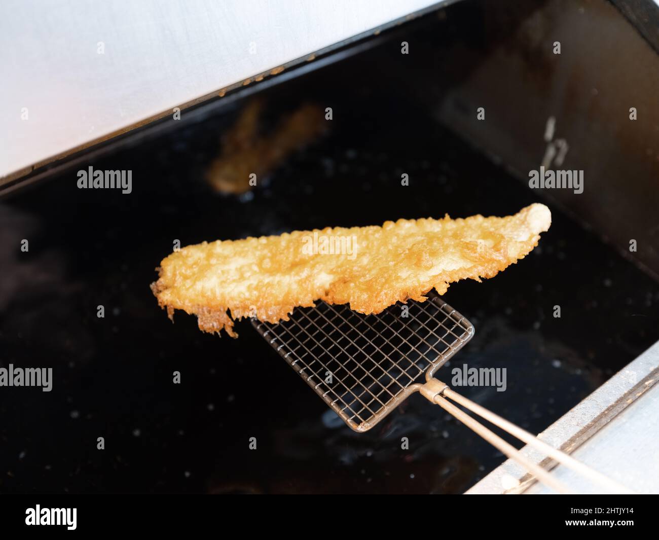 Freshly fried fish in crispy golden batter, at Compo's fish and chip ...