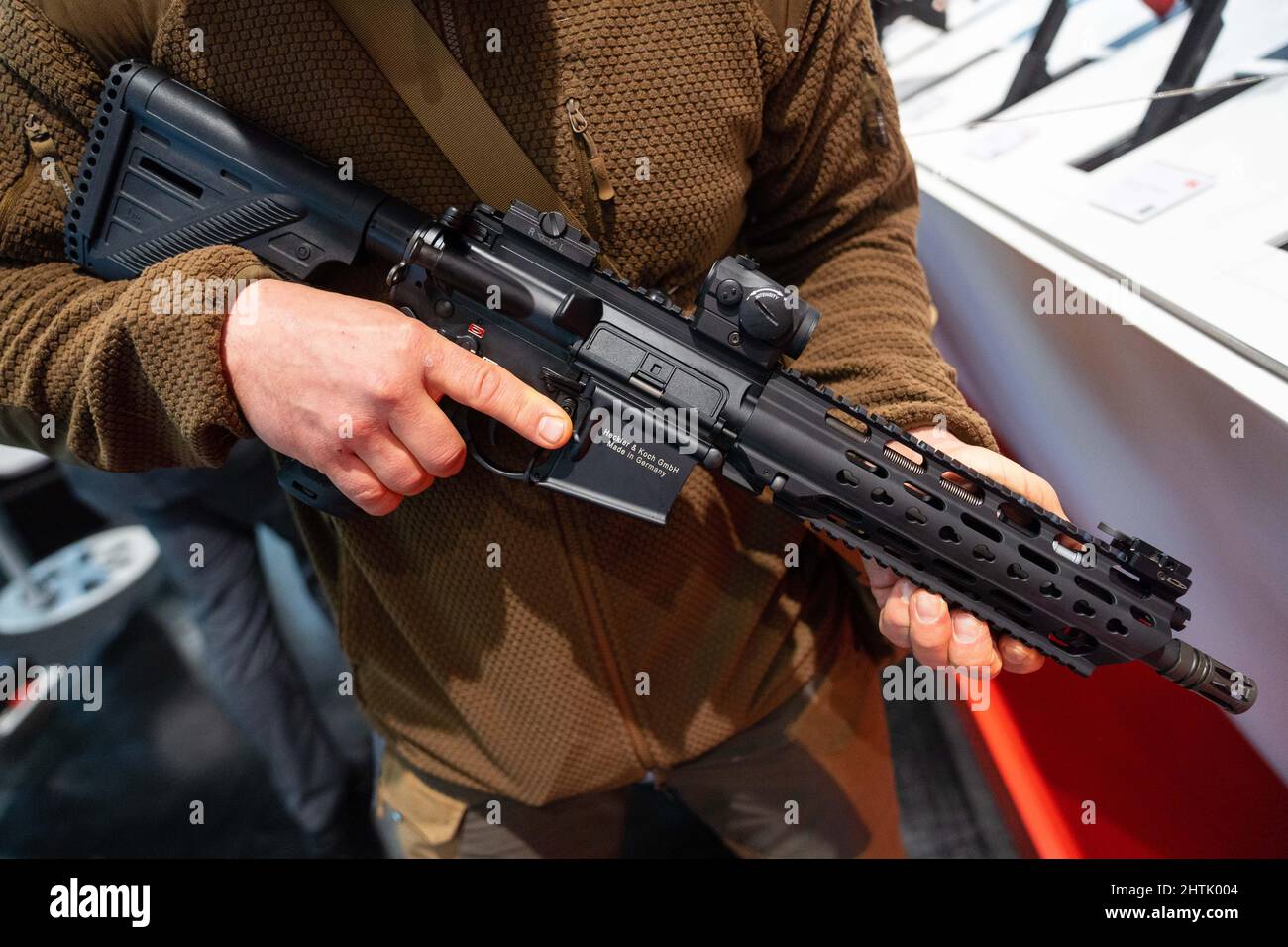 Nuremberg, Germany. 01st Mar, 2022. A man holds the G38 MDW assault ...